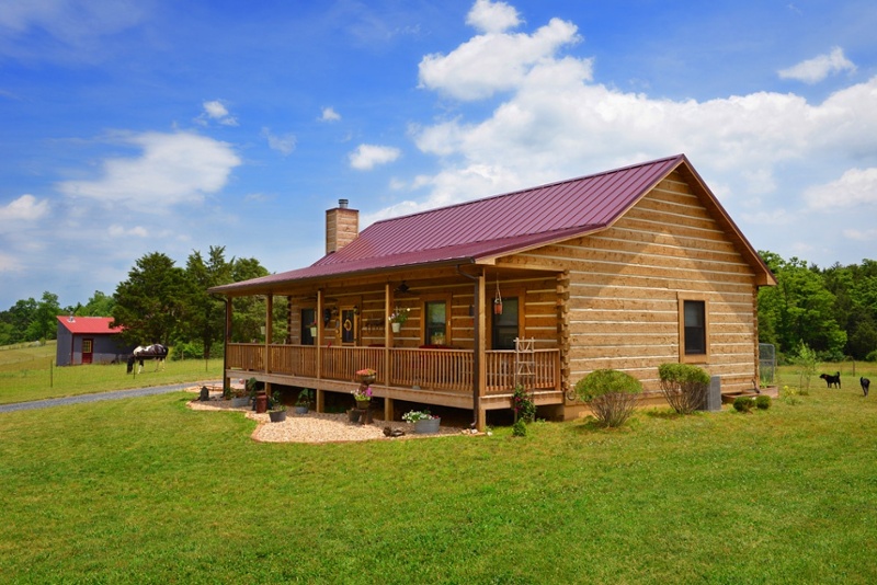 Metal vs Shingle - Things to consider for your Log Home Roofing Solutions